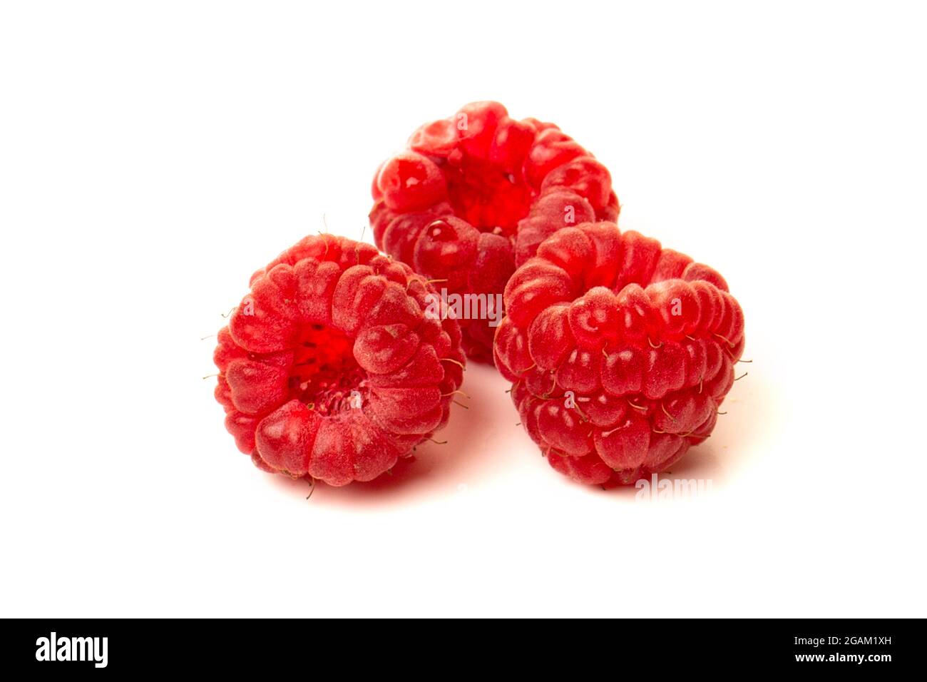 Red ripe raspberries isolated on white background close up Stock Photo ...