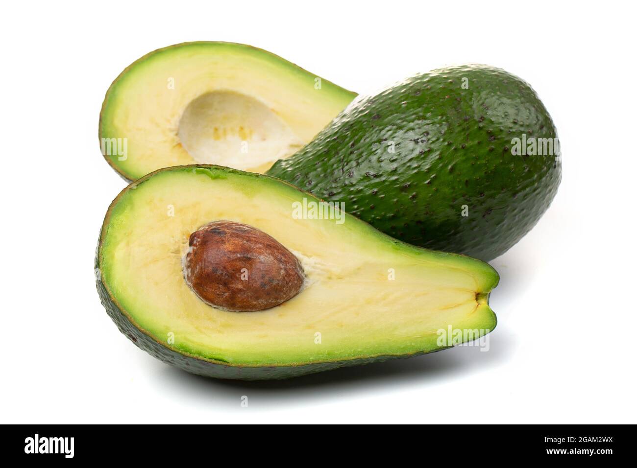 Avocado whole fruit and slices, isolated on a white background Stock ...
