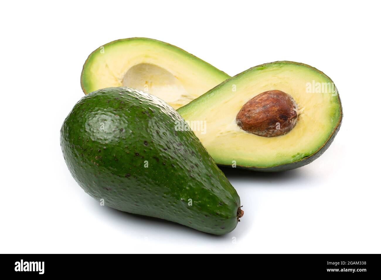 Avocado whole fruit and slices, isolated on a white background Stock ...