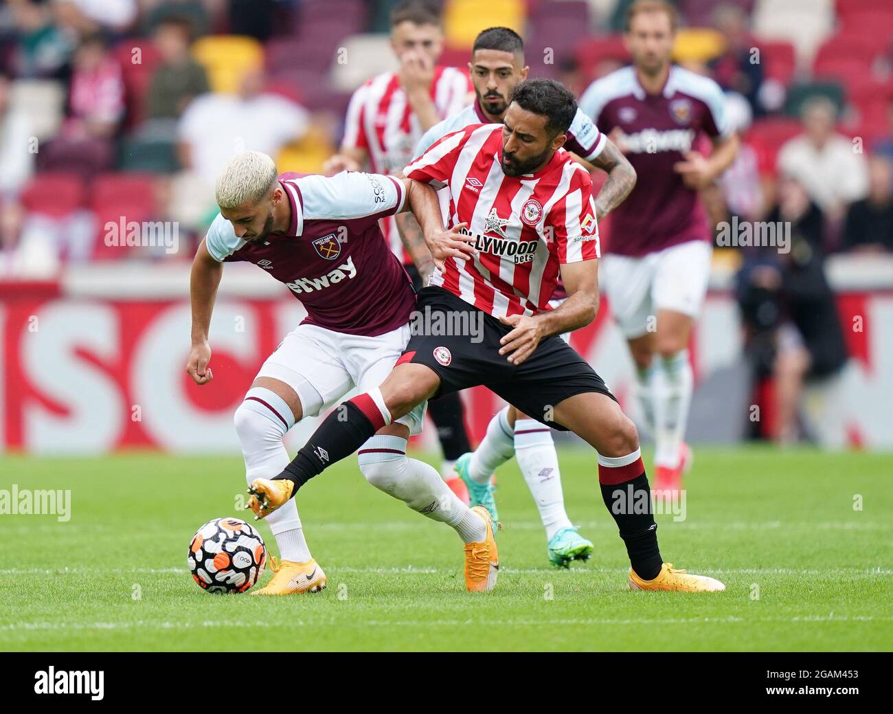 West Ham United's Sa??d Benrahma (left) and Brentford's Saman Ghoddos ...