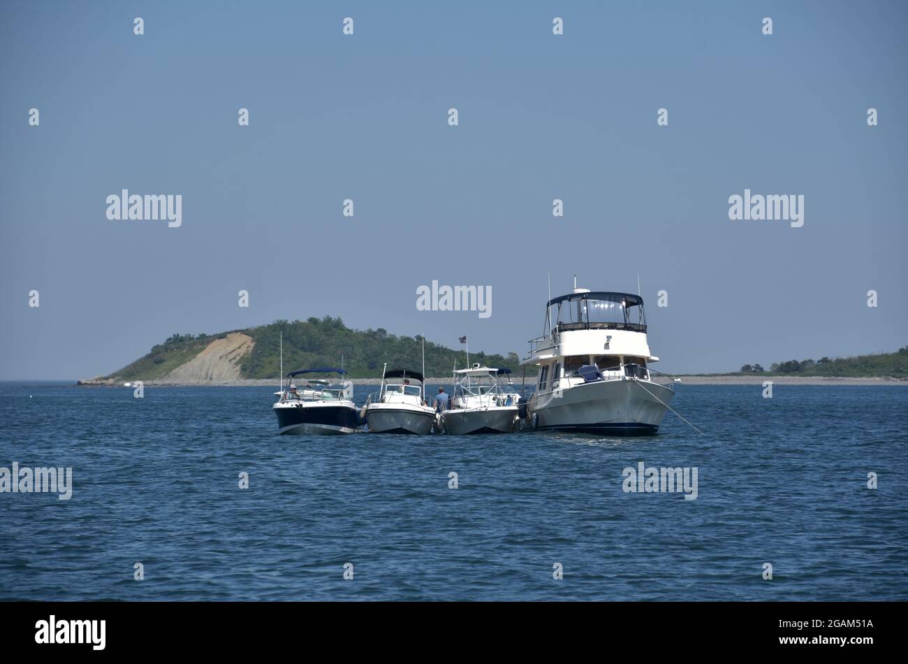 Boats rafted together in Boston Harbor on a warm summers day Stock ...