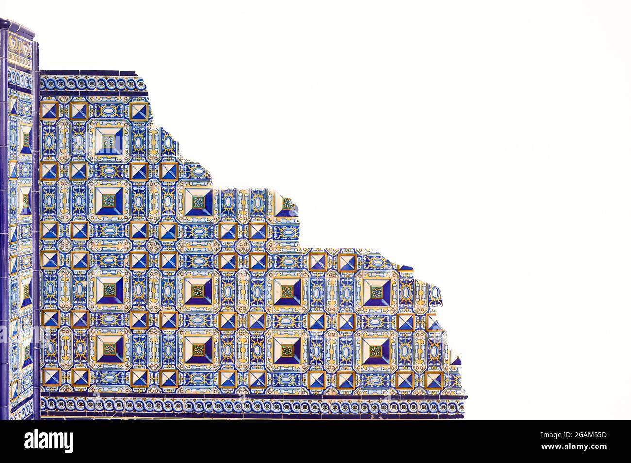 White Wall with ancient blue tiles Stock Photo - Alamy
