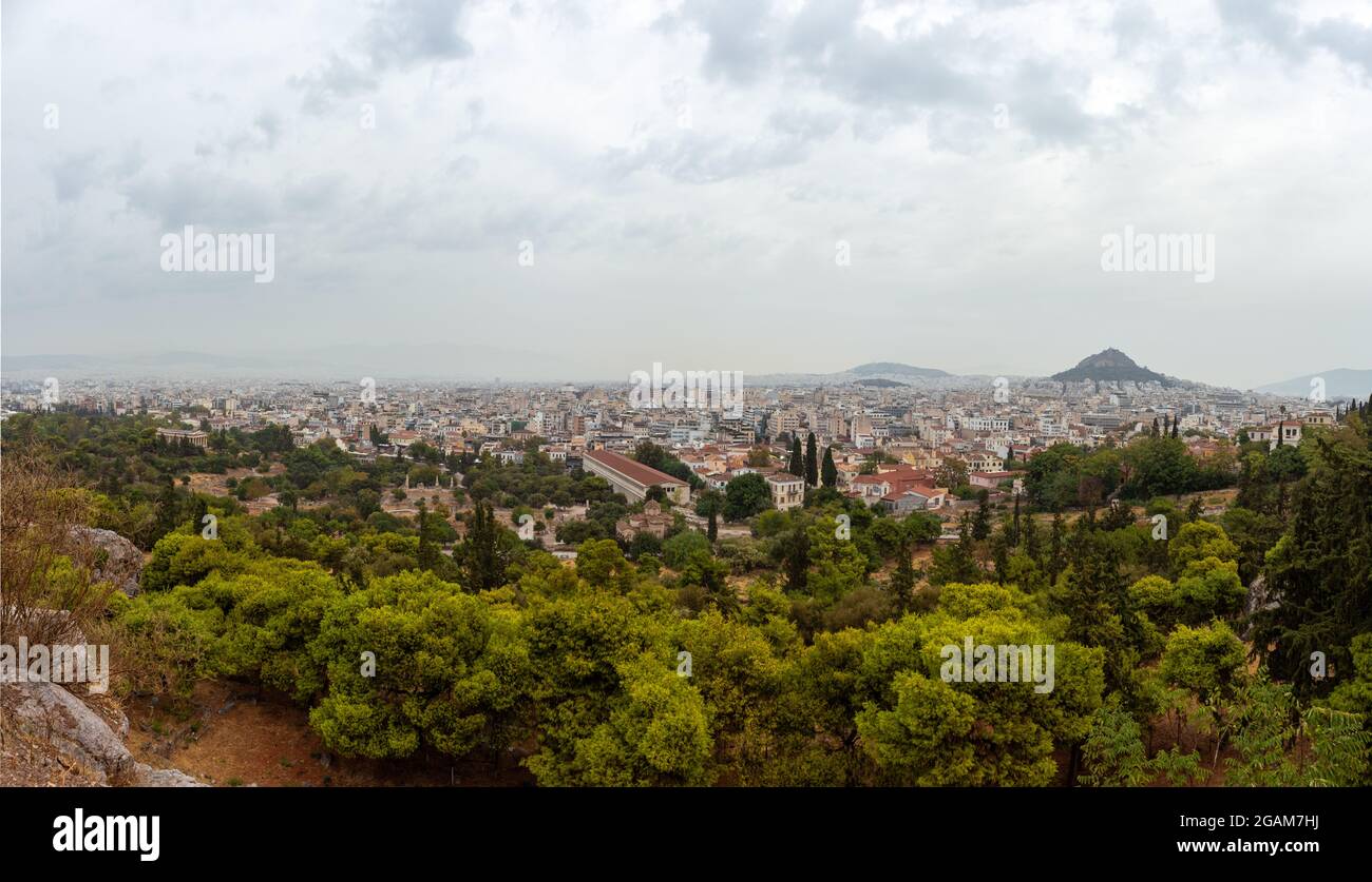Panorama view on Acropolis (Parthenon), mount Lycabettus and Athens old city center architecture ...