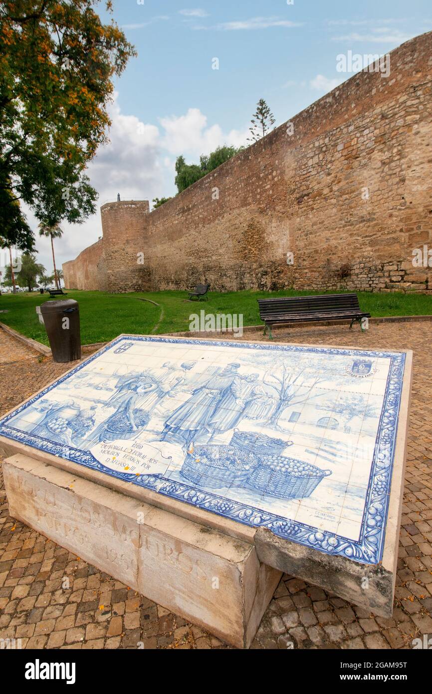 View of the famous Historical castle wall on the city of Faro, Portugal ...