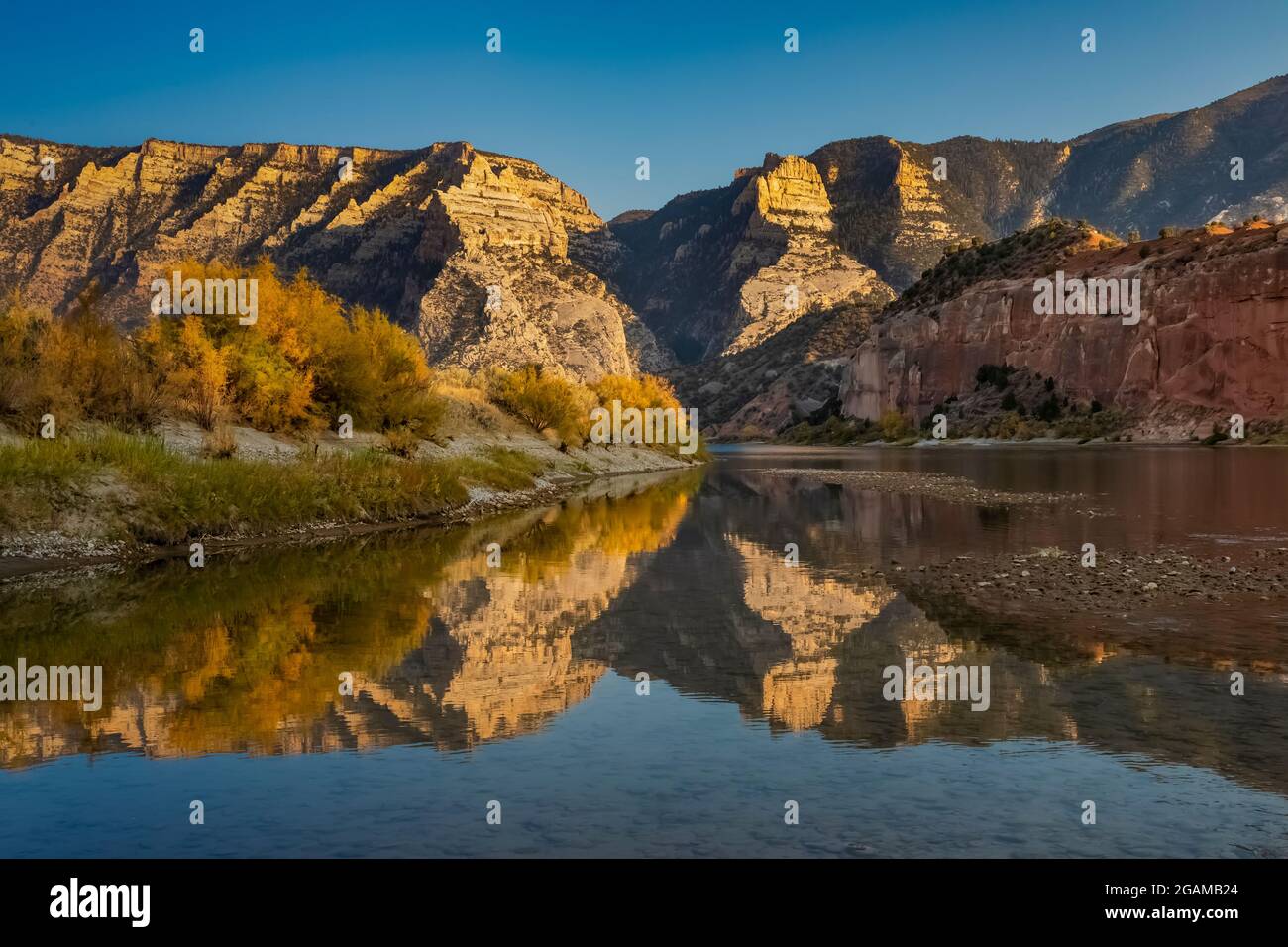 Dramatic view of Split Mountain Canyon reflecting in Green River in ...