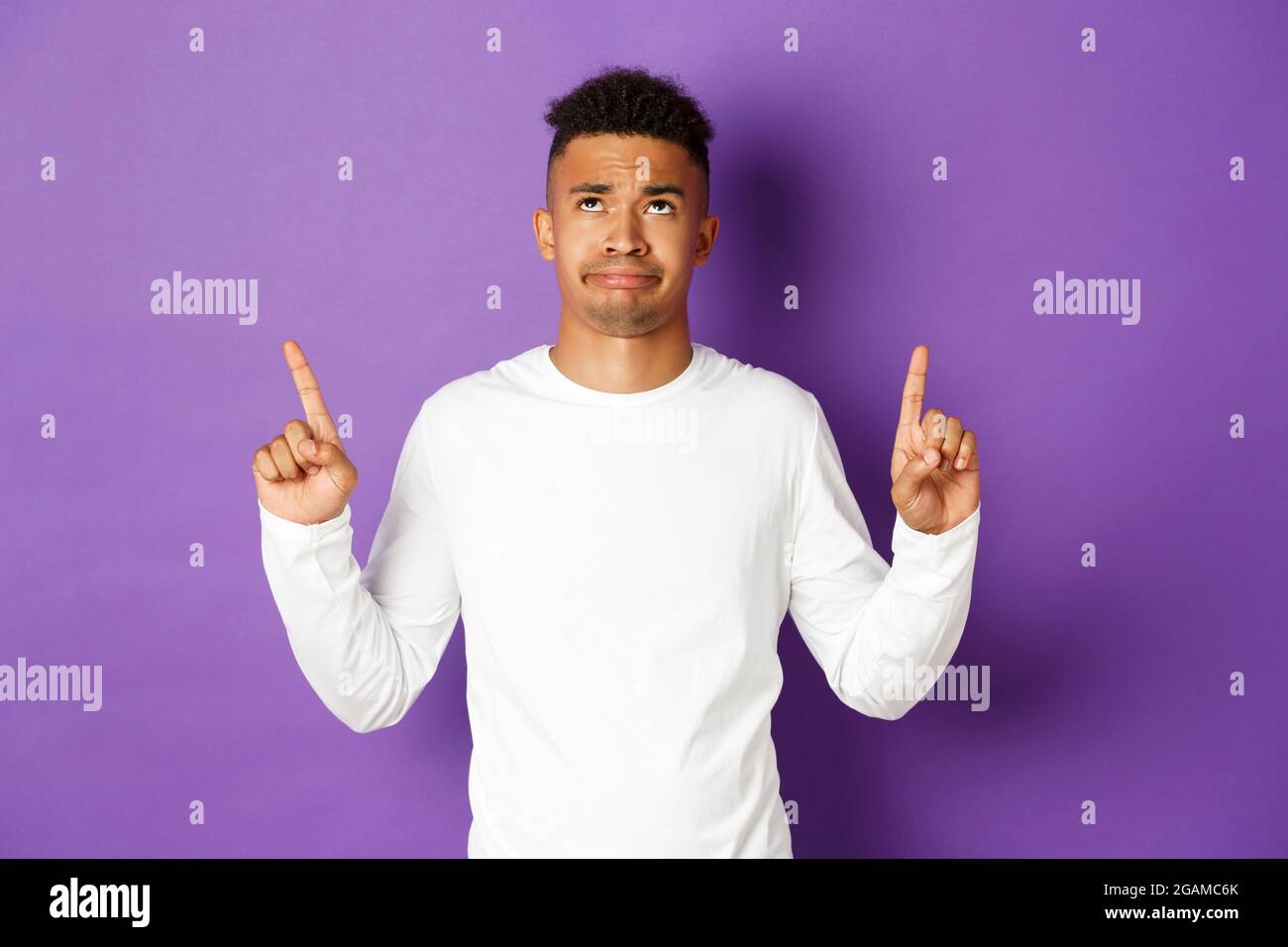 Skeptical and disappointed african-american male student, complaining ...