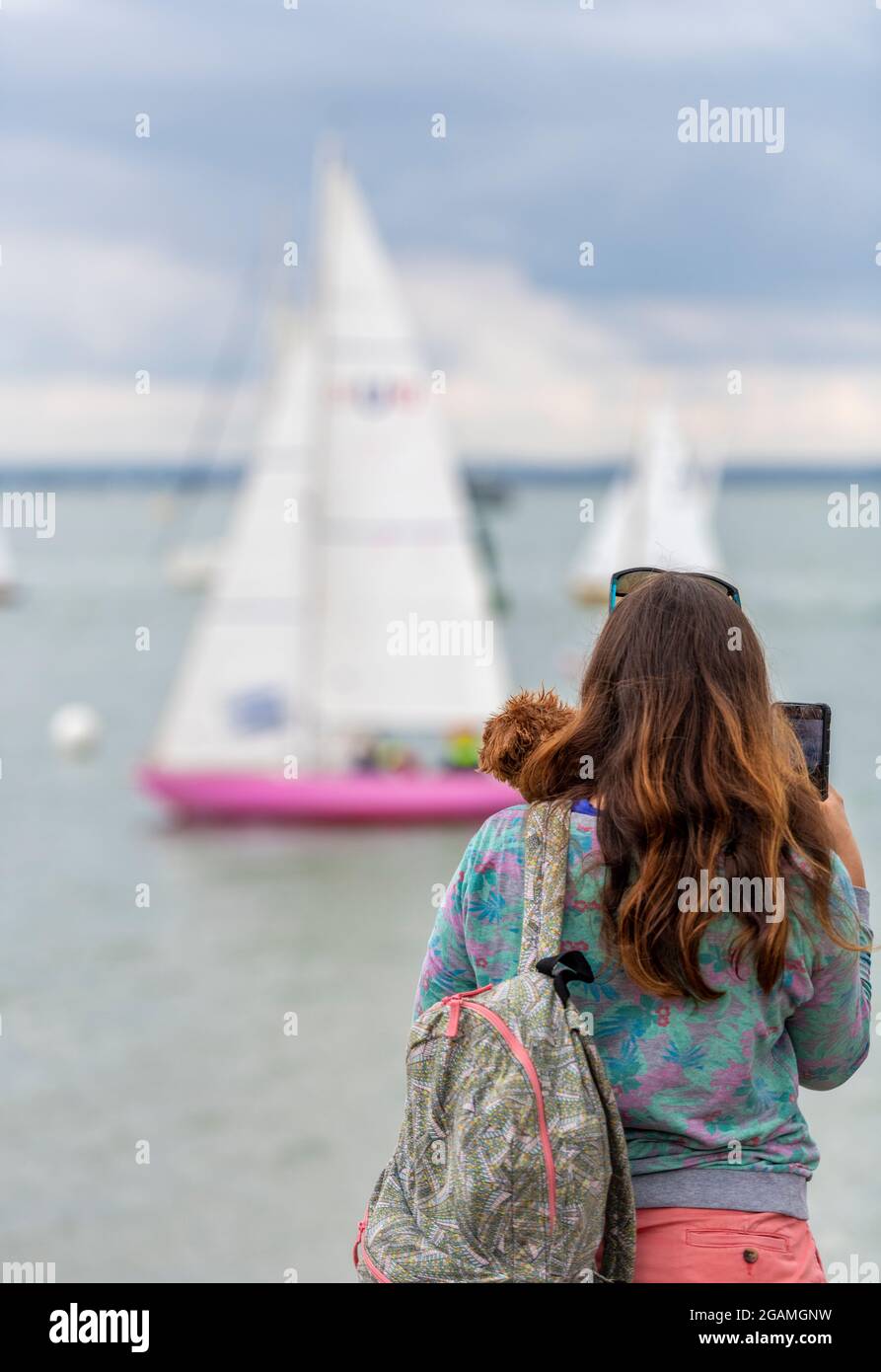 Female observing yachts hi-res stock photography and images - Alamy