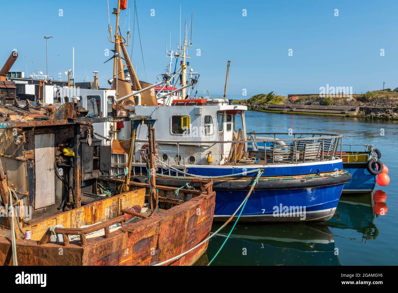fishing boats and trawlers in the harbour at Girvan in Ayrshire ...