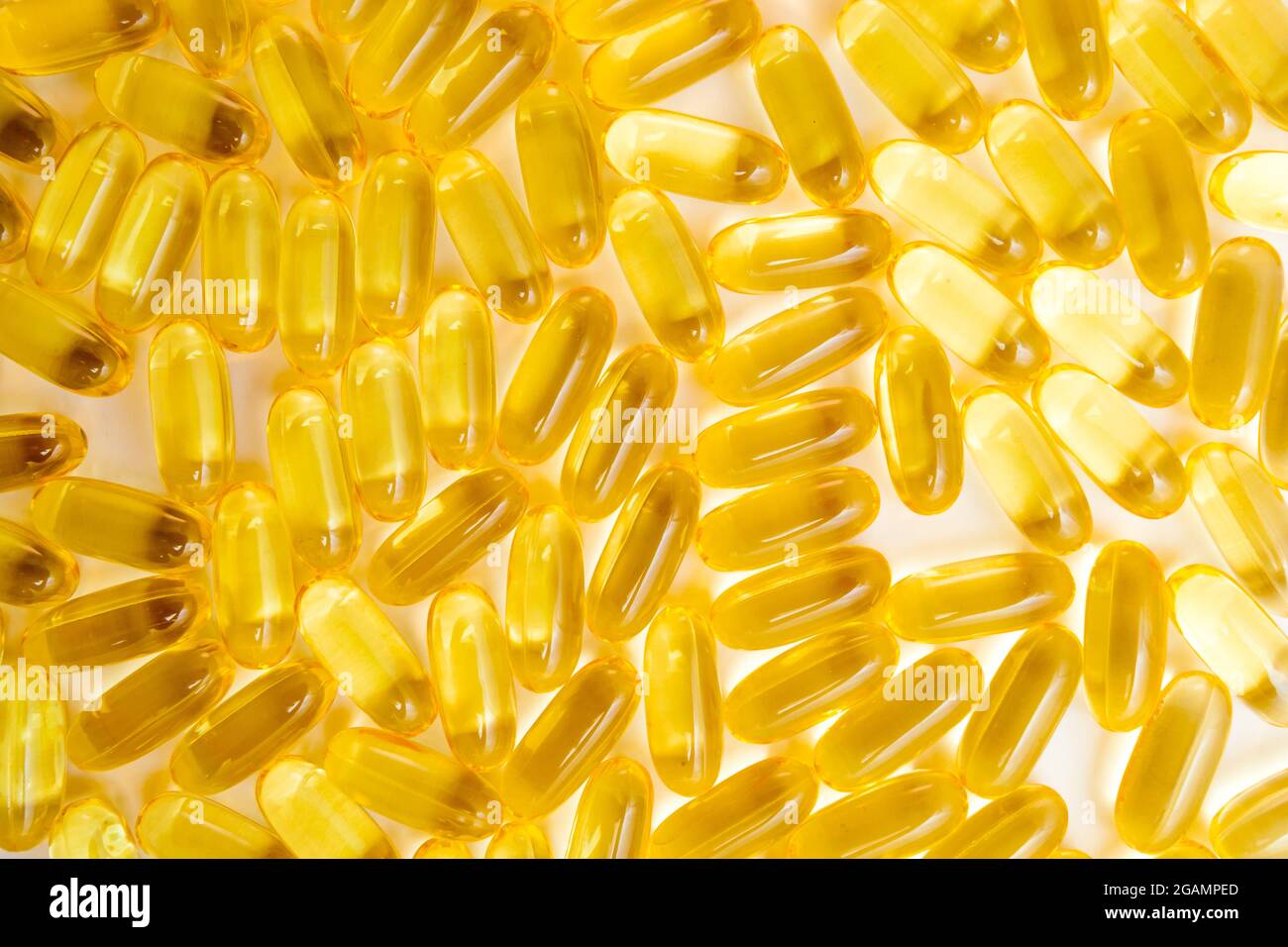 fish oil omega 3 on white background texture Stock Photo - Alamy