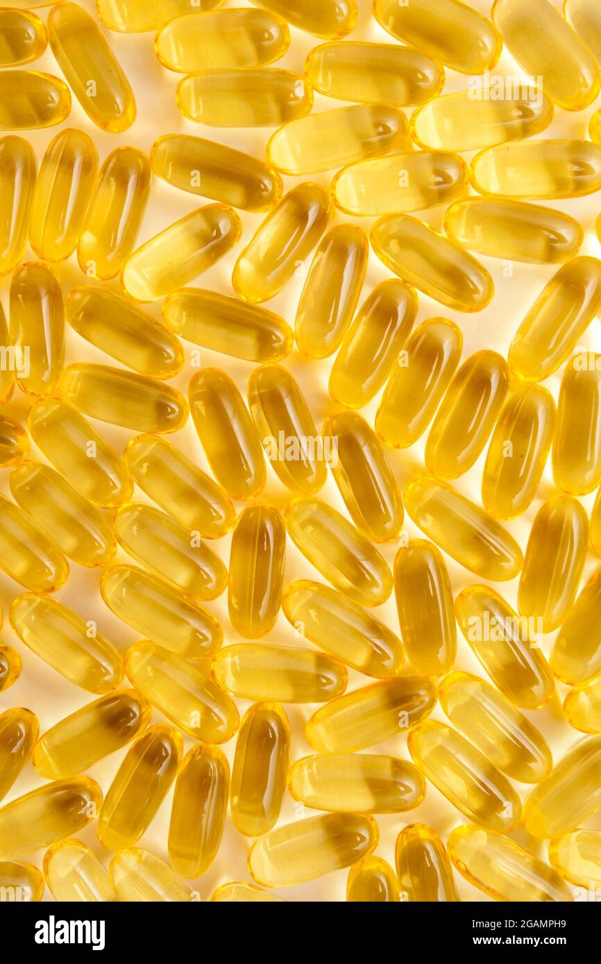 fish oil omega 3 on white background texture Stock Photo - Alamy