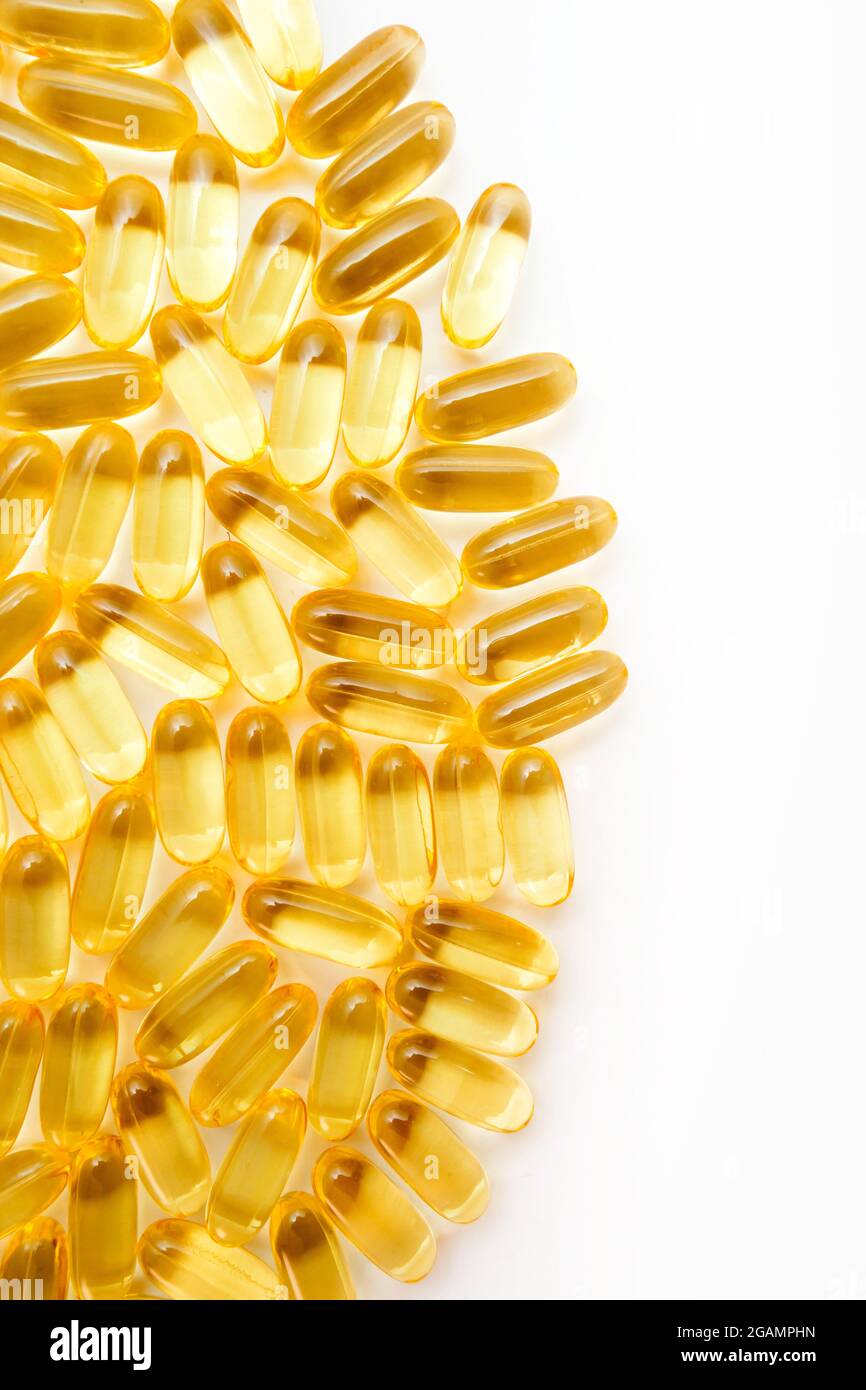 fish oil omega 3 on white background texture Stock Photo - Alamy