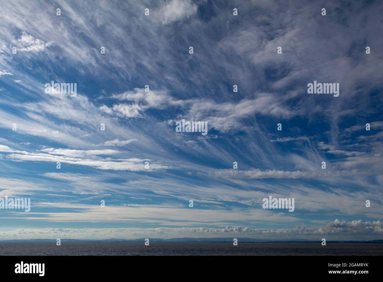 Cirrus clouds against a blue sky Stock Photo - Alamy