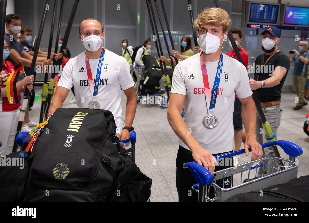 31 July 2021, Hessen, Frankfurt/Main: Rowers Jason Osborne (r) and Jonathan Rommelmann, silver ...