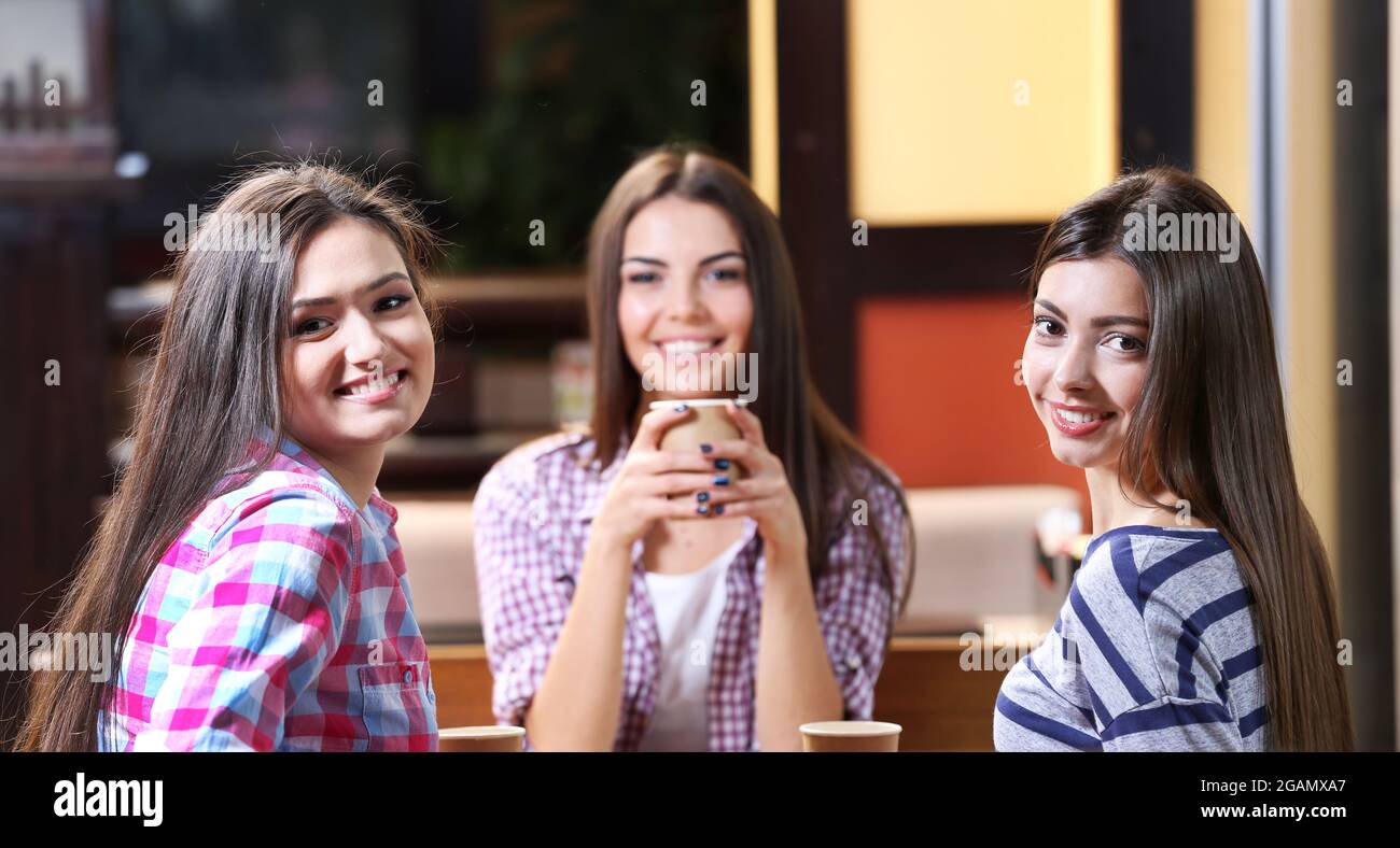 Beautiful girls in cafe Stock Photo - Alamy