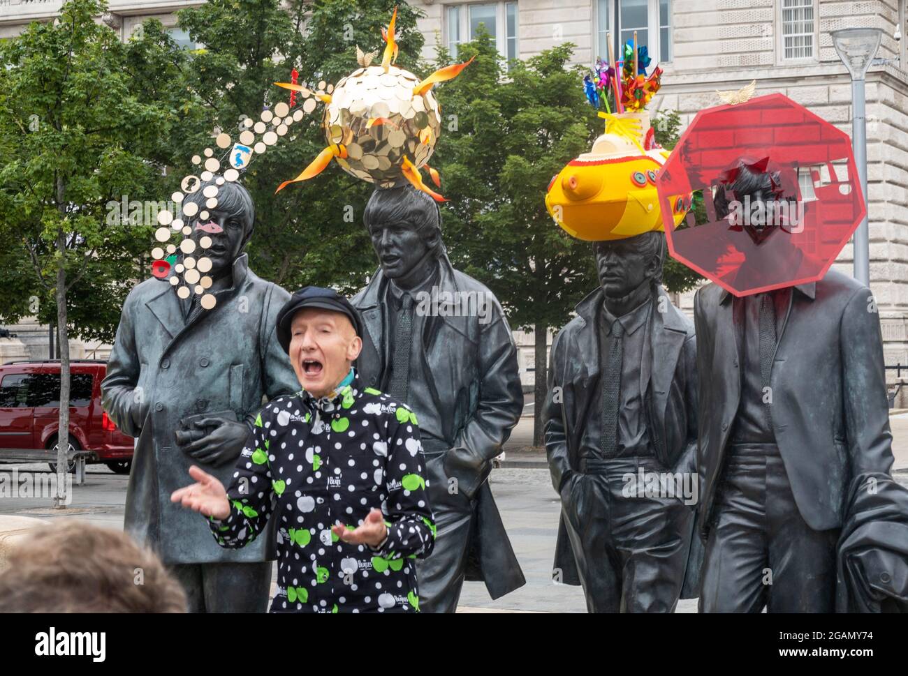 The Beatles statue by Andy Edwards is redressed by artist Stephen Jones ...
