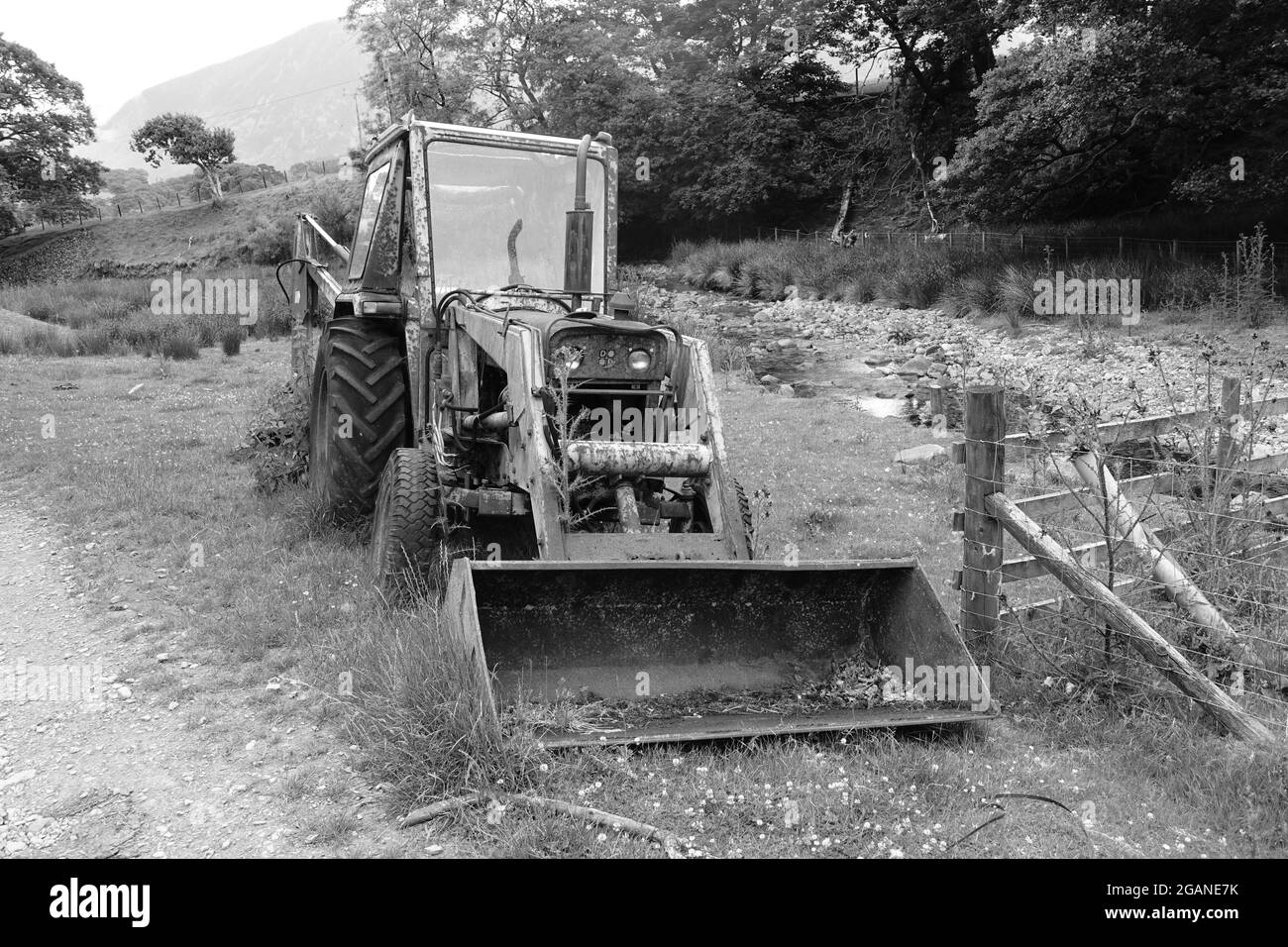 Harvesting work with tractor Black and White Stock Photos & Images - Alamy