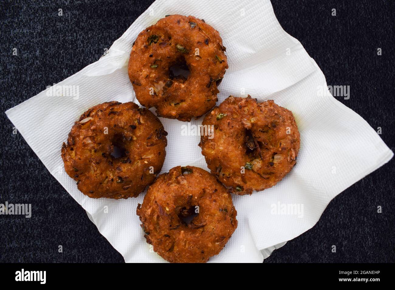 Delicious Poha wada or Poha pakoda also known as Flattened rice and ...