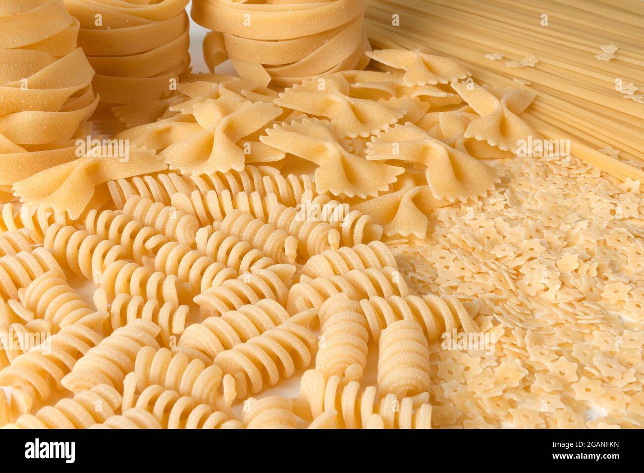 Types of Italian pasta: fusilli, farfalle, fettuccine, spaghetti, stars ...