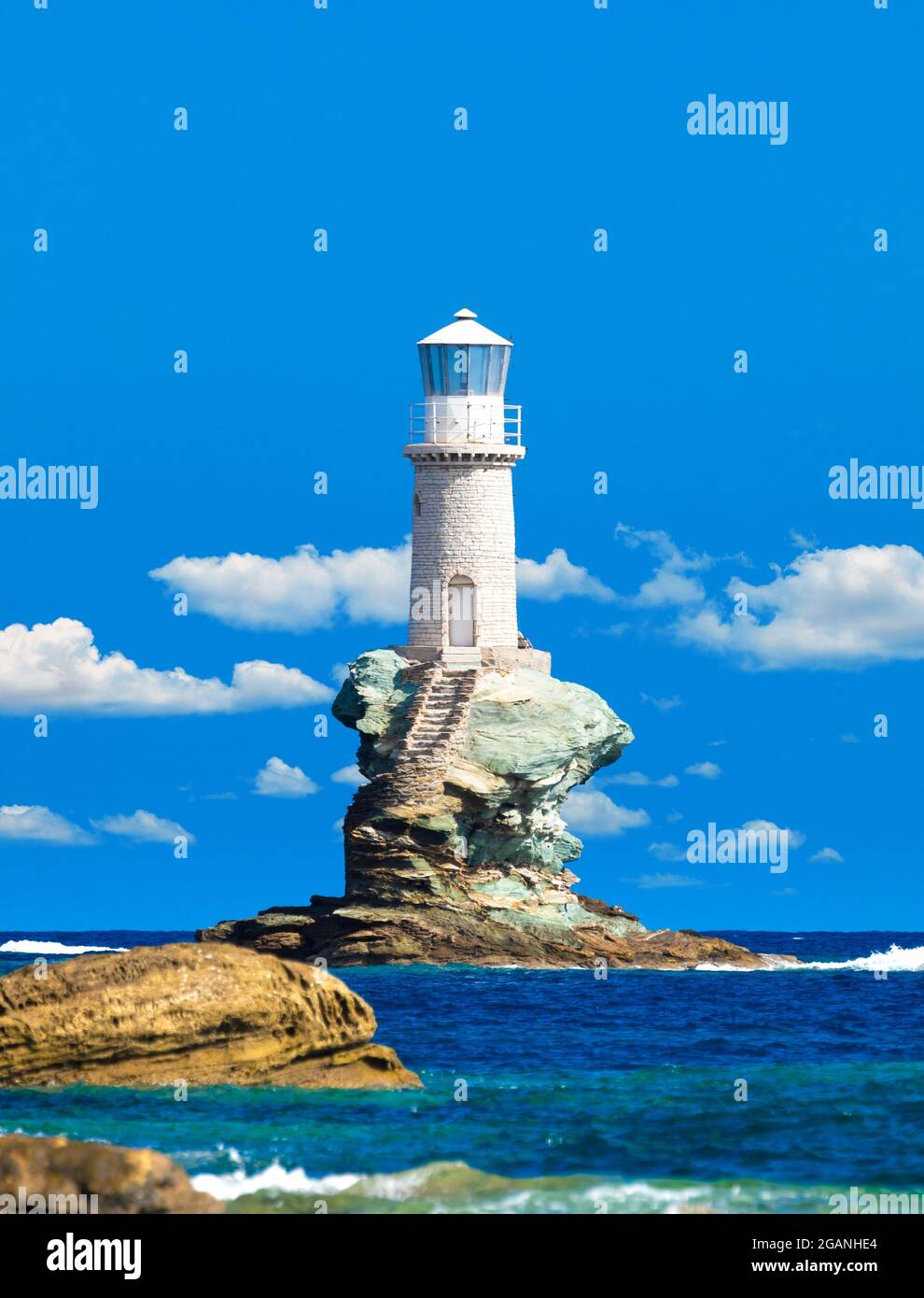 The beautiful Lighthouse Tourlitis of Chora at night. Andros island ...