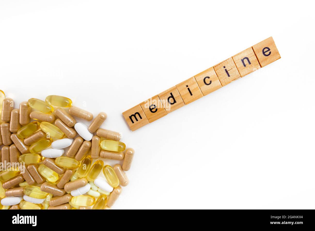 inscription MEDICINE in wooden cubes on a white background of different ...