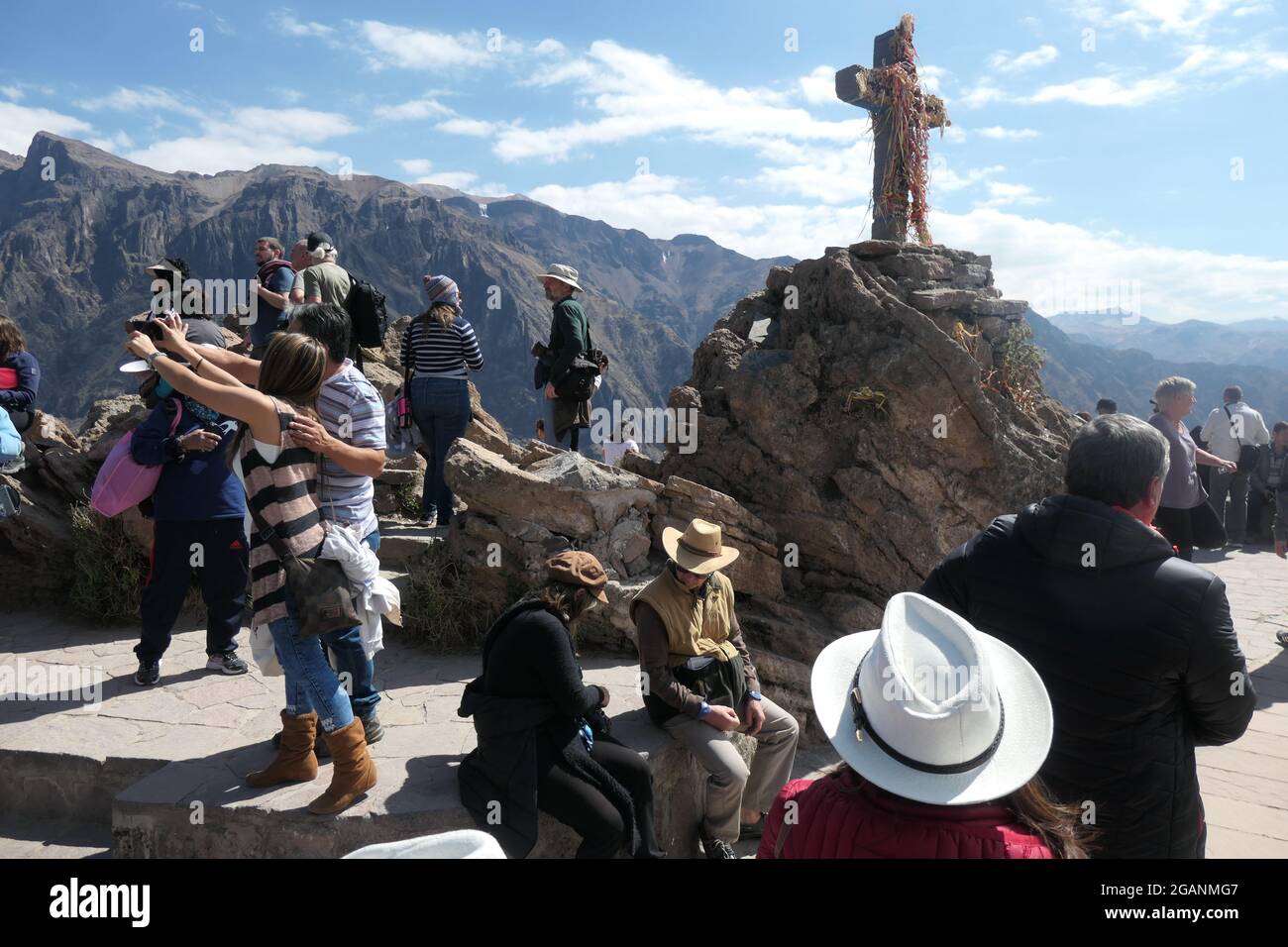 Peru landscape people looking for a condor bird in the sky famous cross ...