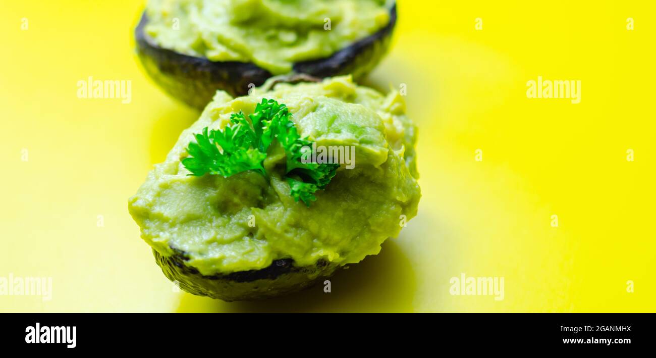 Smashed avocado, smother avocado with lemon juice served on the for ...