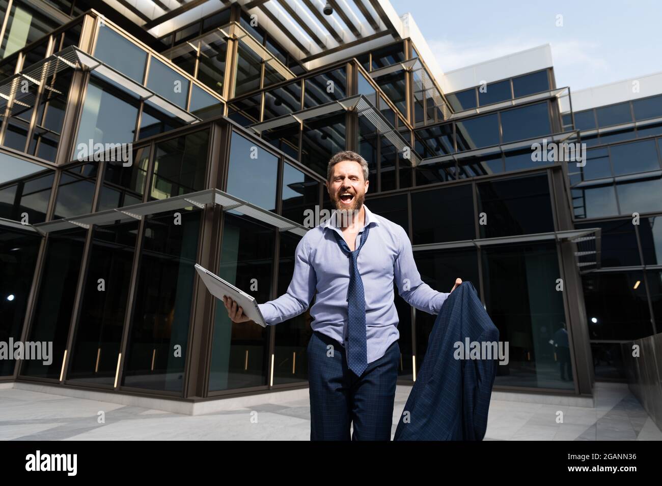 successful happy businessman man celebrating business success outside ...