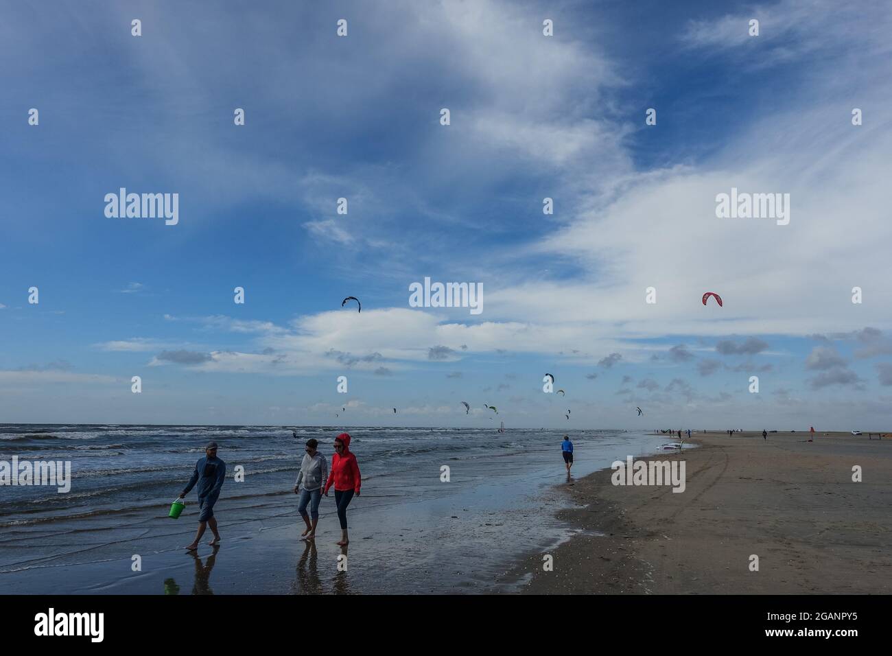 Denmark, 30th, July 2021 People walking by the sea are seen at Romo ...