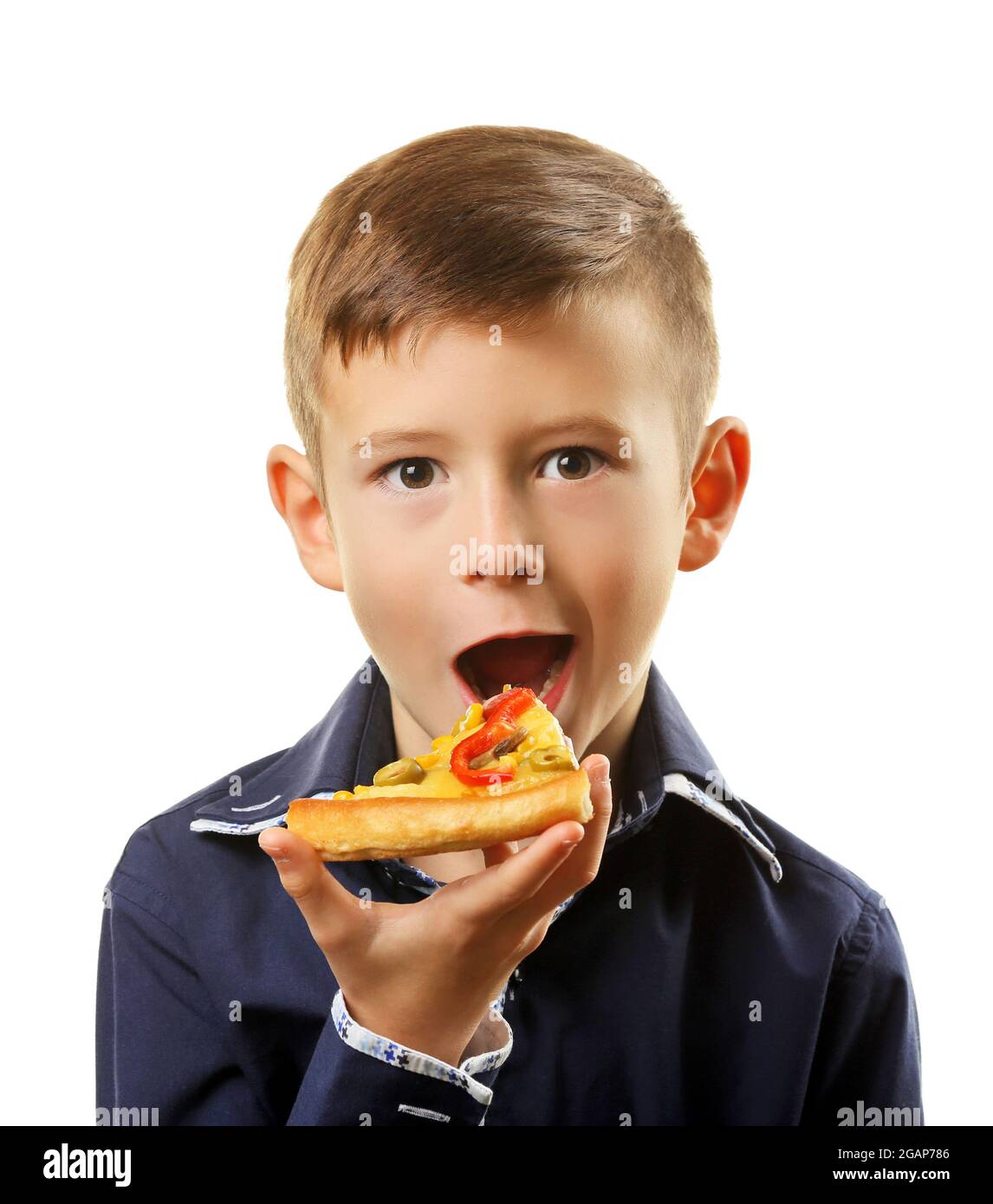 Little boy eating pizza isolated on white Stock Photo - Alamy