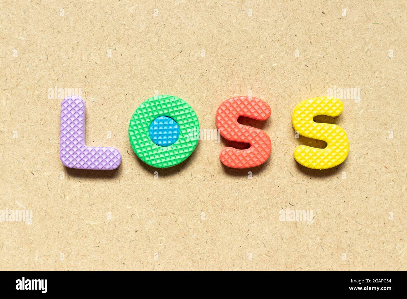 Foam alphabet letter in word loss on wood background Stock Photo - Alamy