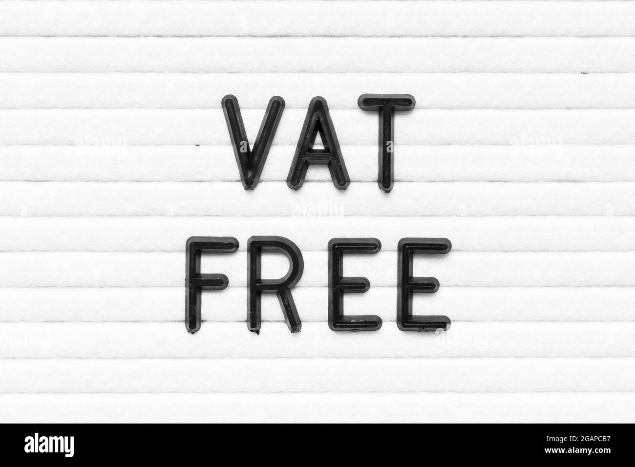 Black alphabet letter in word vat free on white felt board background ...