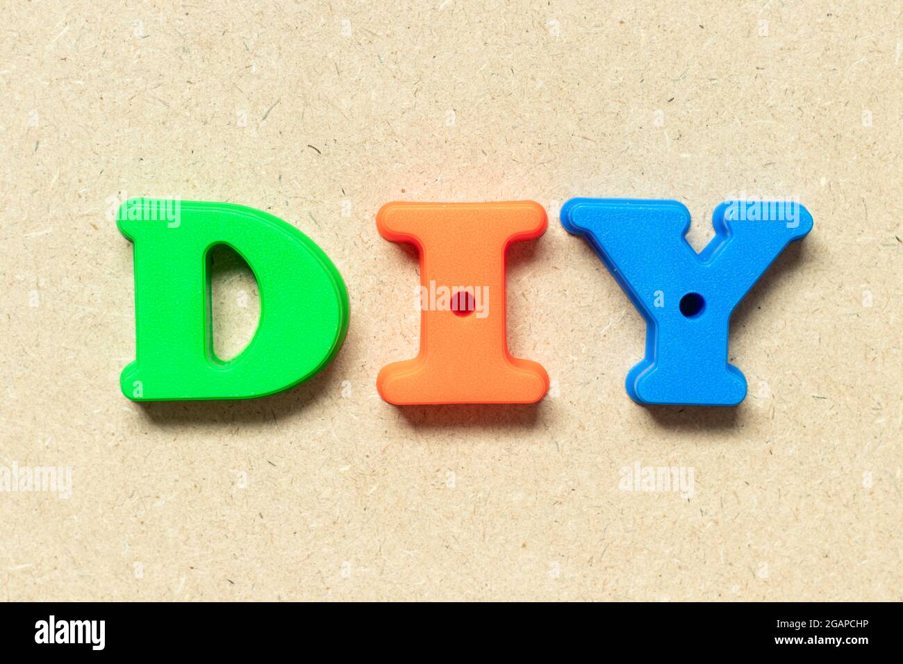 Plastic alphabet letter in word DIY (abbreviation of do it yourself) on ...