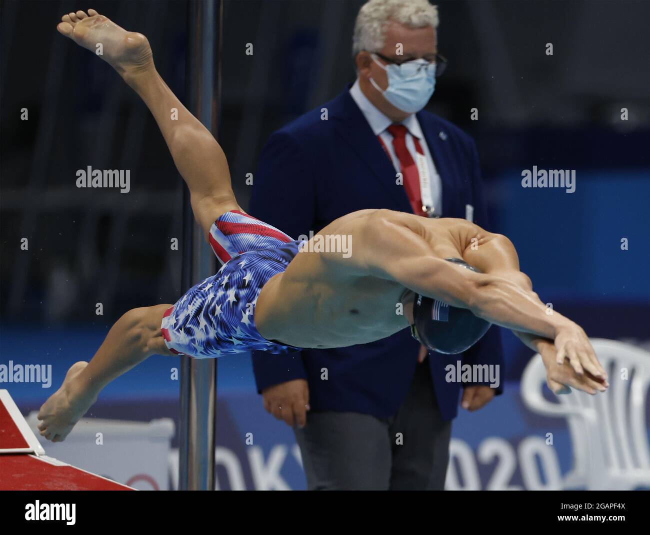 Tokyo, Japan. 31st July, 2021. USA's Robert Finke leaps off the block ...