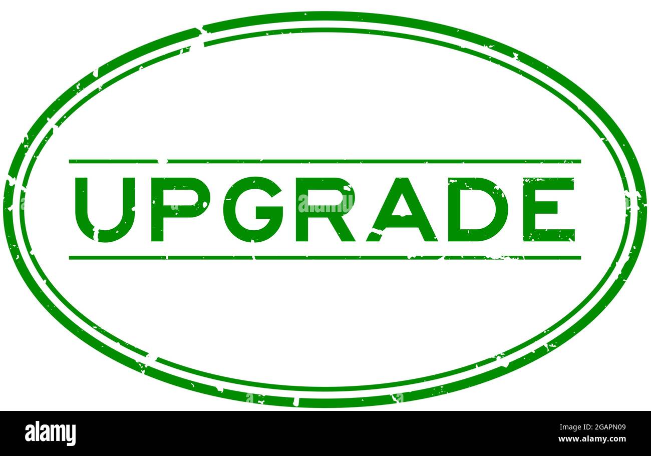 Grunge green upgrade word oval rubber seal stamp on white background ...