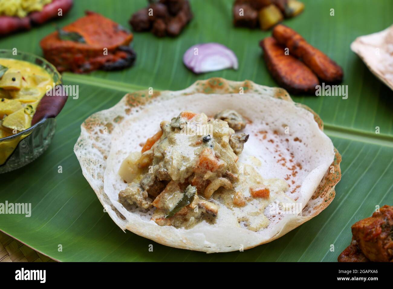 Appam, Hoppers and mutton stew Kerala breakfast food and Indian milk ...