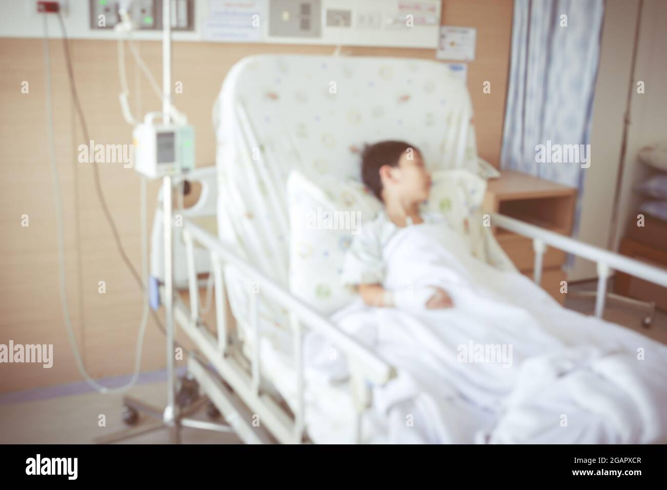 Abstract blurred background of illness asian child admitted at modern ...