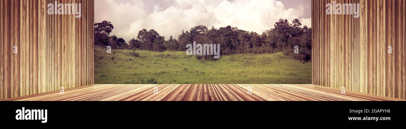 Panorama of perspective wooden floor and wall with fresh green forest ...