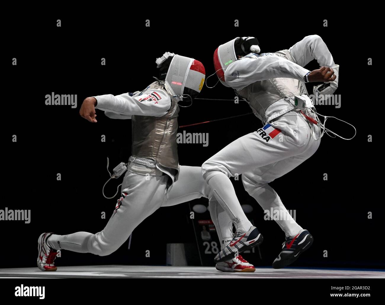 Chiba, Japan. 1st Aug, 2021. Mohamed Hamza of Egypt (L) competes ...