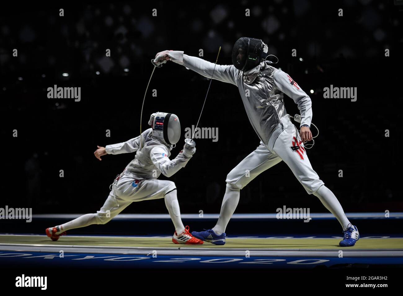 Chiba, Japan. 1st Aug, 2021. Anton Borodachev (L) of ROC competes ...