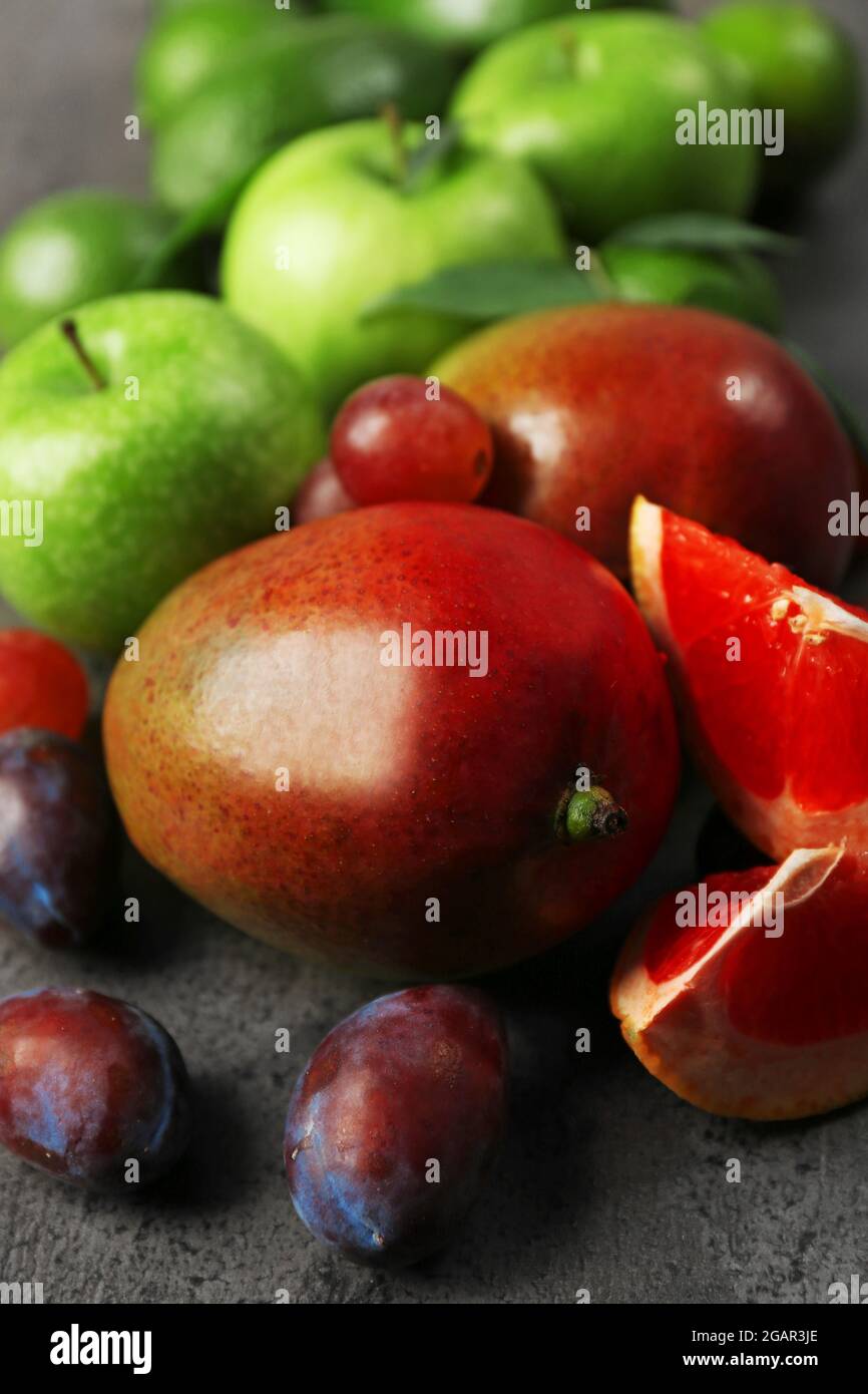 Fruits on dark grey background Stock Photo - Alamy