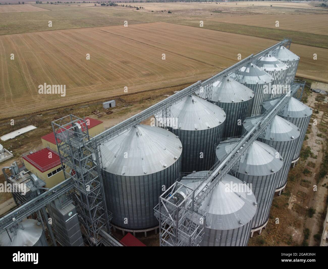 Grain elevator. Metal grain elevator in agricultural zone. Agriculture ...