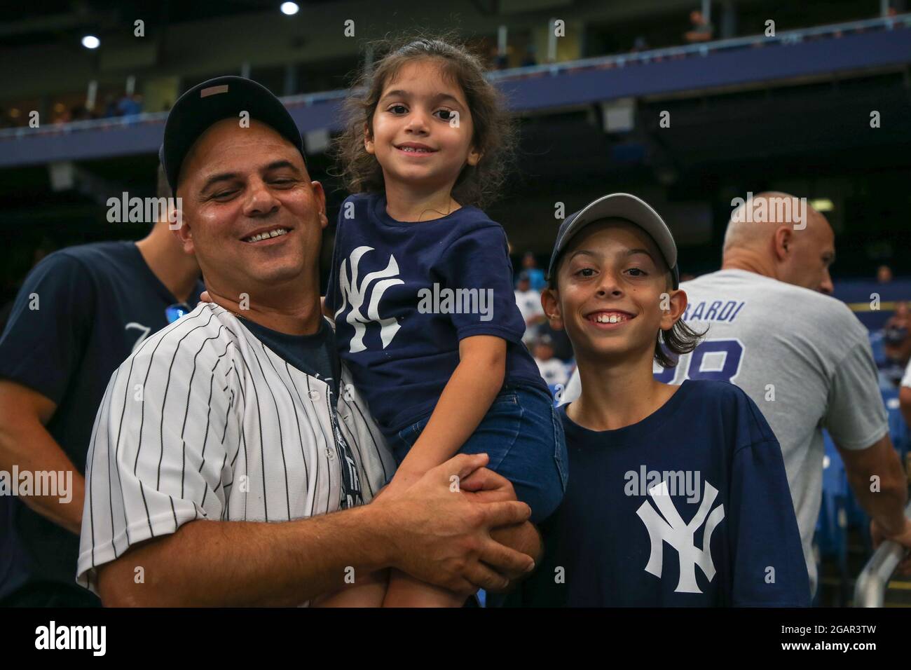 St. Petersburg, FL. USA; A true Yankees fan and father along with his ...