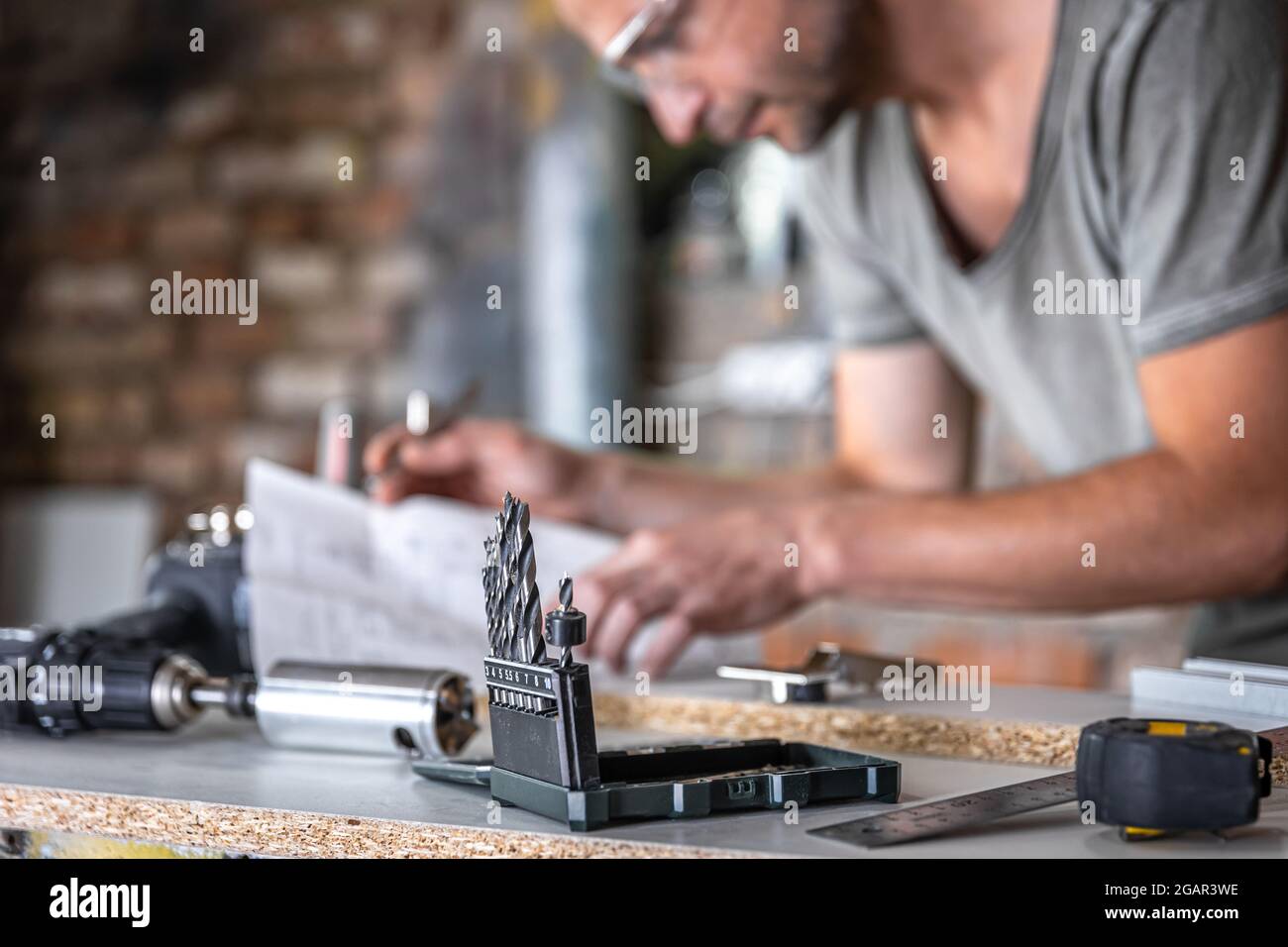 Close up of a set of wood drills on a work table of a joiner in a ...