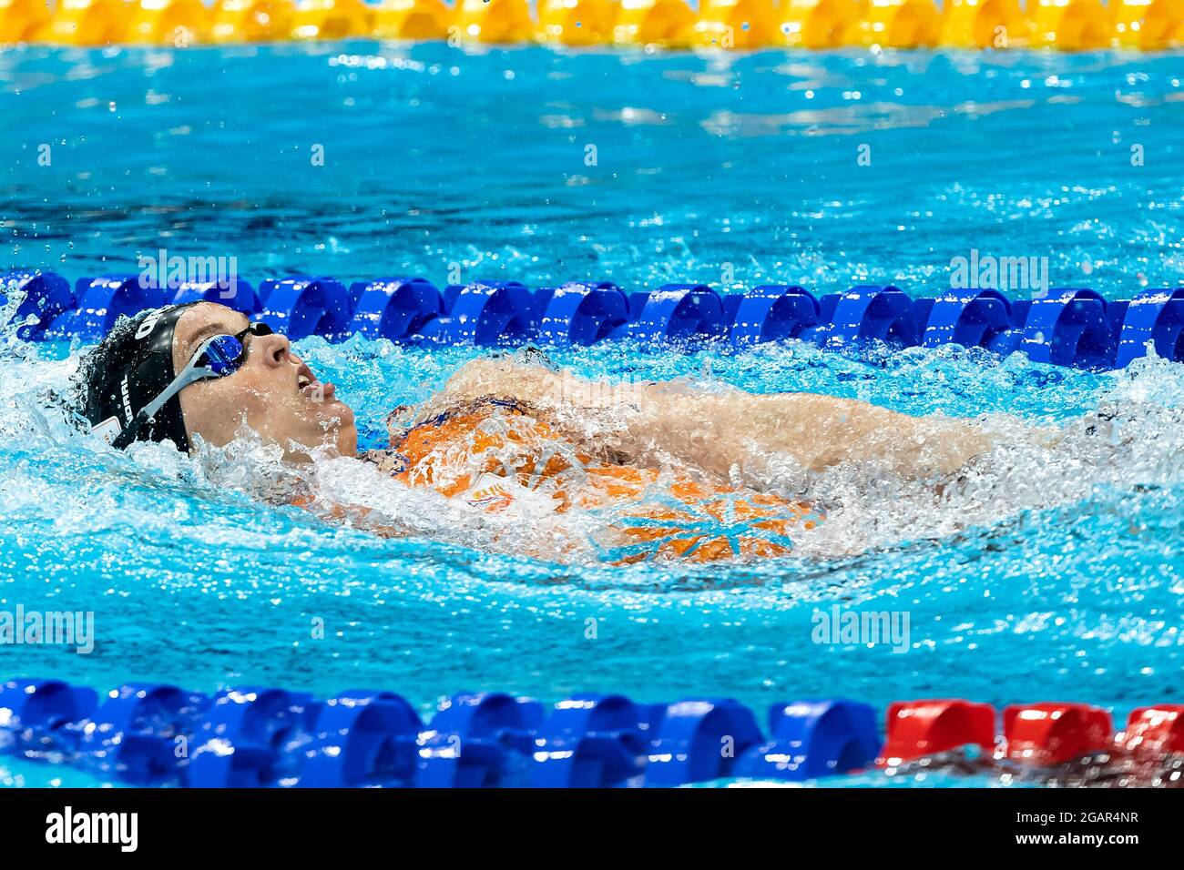 TOKYO, JAPAN - JULY 29: competing in the mixed 4x100m medley relay ...