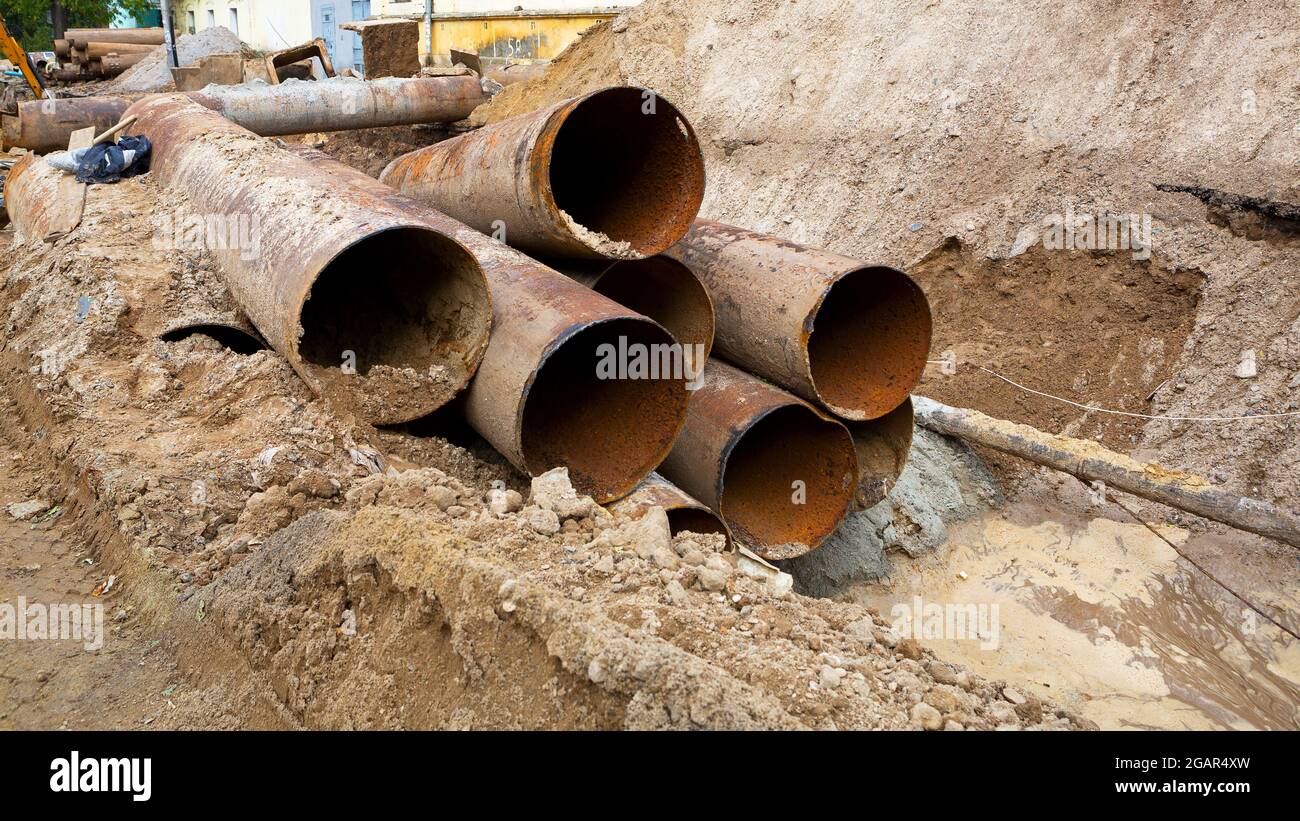 Fragments of old large water pipes. After many years of operation ...