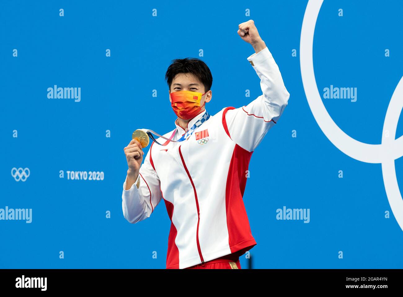 TOKYO, JAPAN - JULY 30: Shun Wang of China shows the gold medal after ...