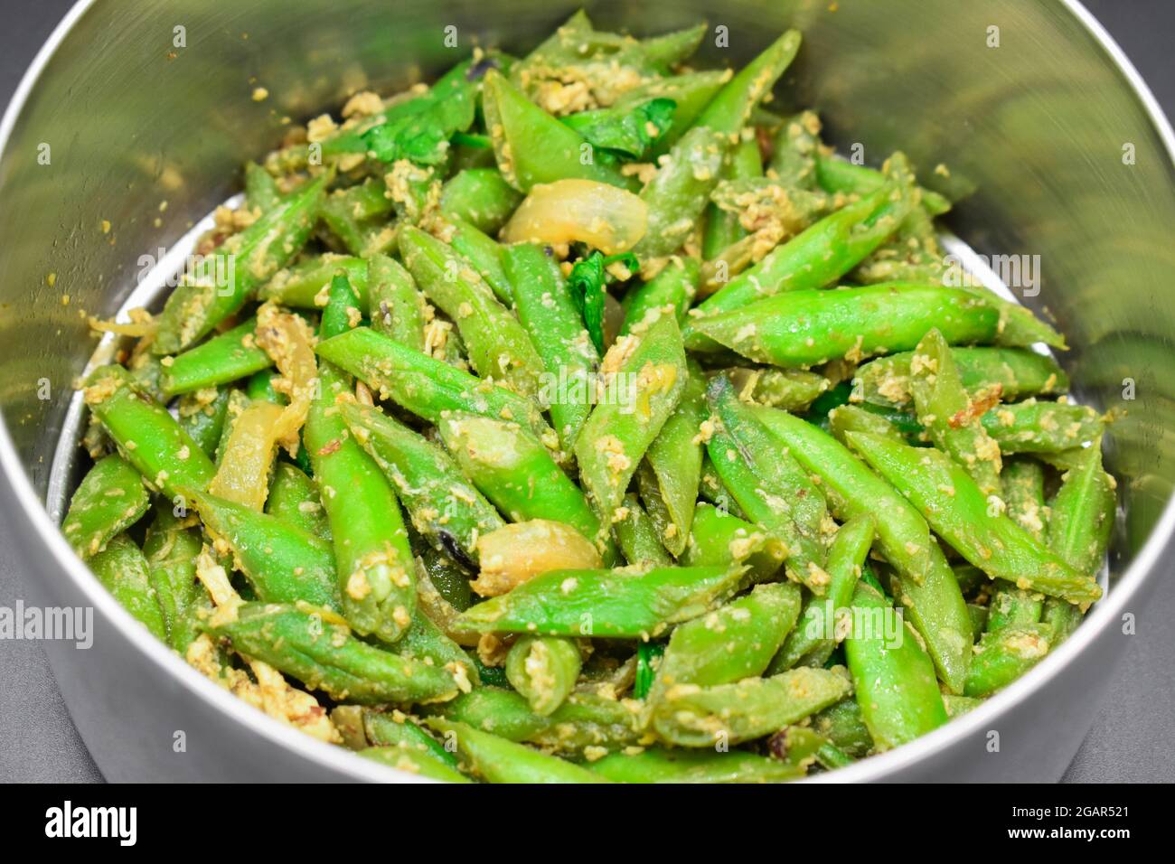 Asian, Myanmar or Burmese green bean curry recipe. Closeup view ...