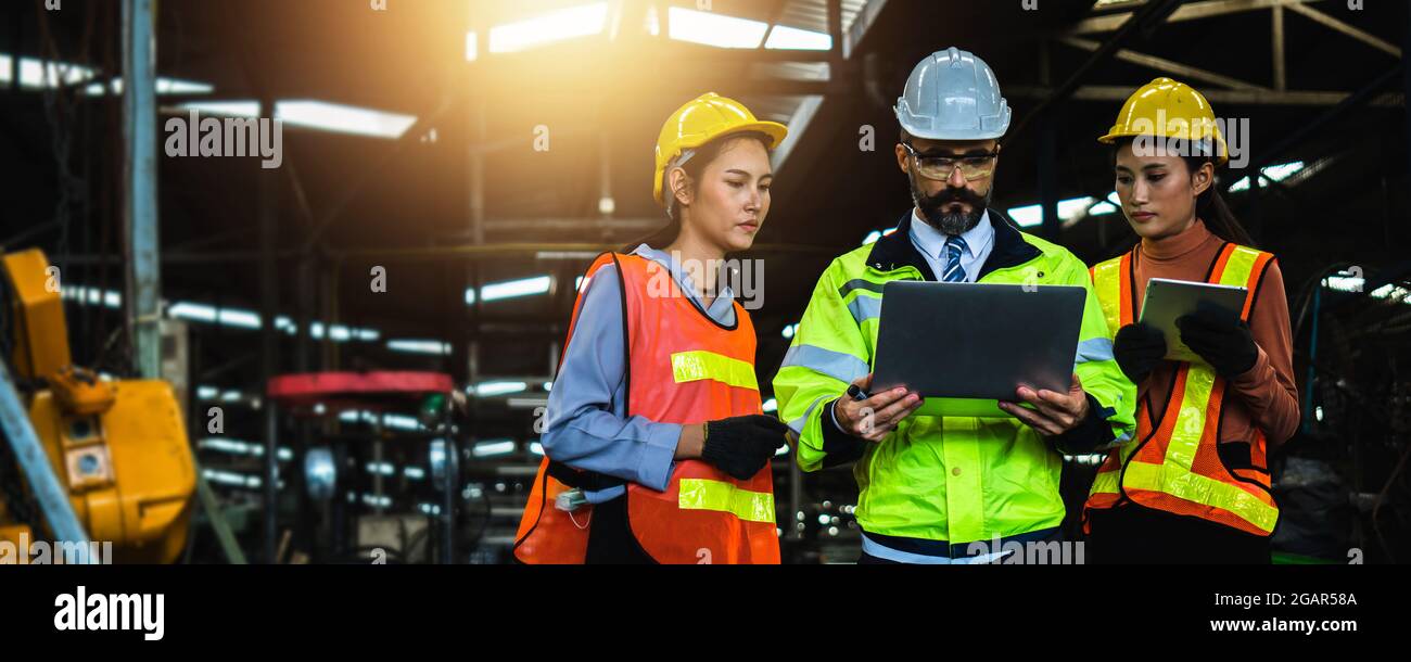 Mechanical engineer manager working in industry and factory control ...