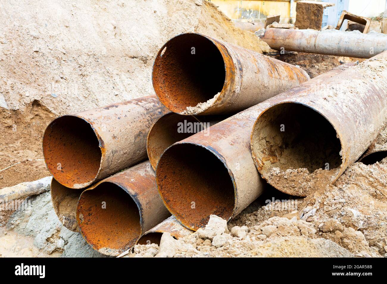 Fragments of old large water pipes. After many years of operation ...