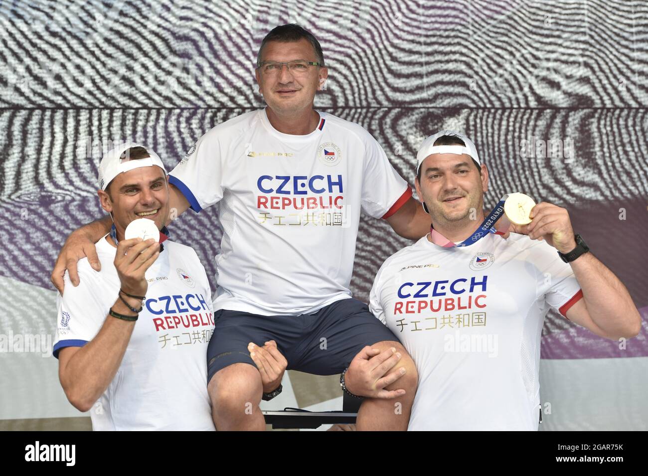 Brno, Czech Republic. 31st July, 2021. Gold medalist Jiri Liptak, right ...